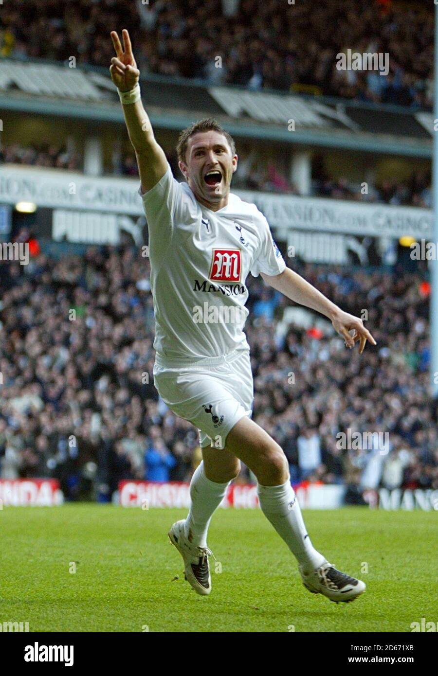 Tottenham Hotspur's Robbie Keane celebrates scoring his side's third ...