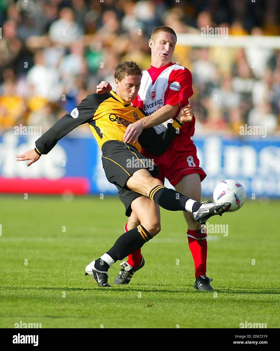 Cambridge United's David Bridges and York City's Lee Bullock battle for ...