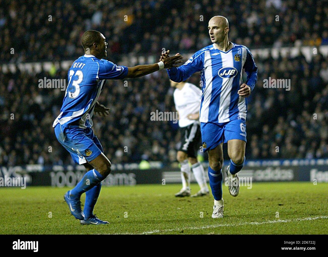 Wigan Athletic's marcus Bent celebrates with his team mate Antoine ...