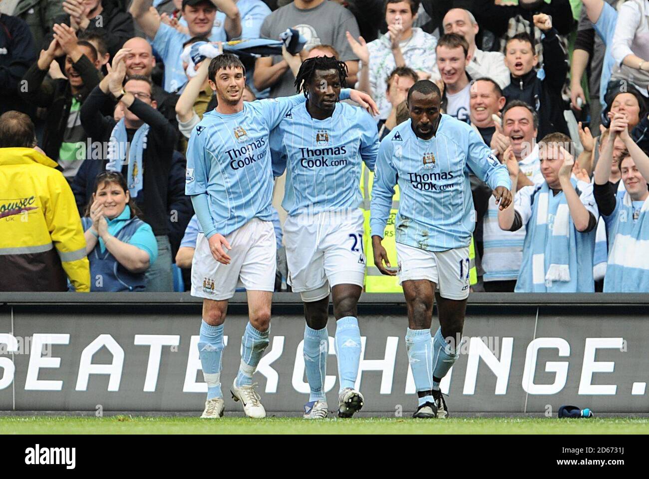 Manchester City's Benjani Mwaruwari (centre) celebrates scoring his ...
