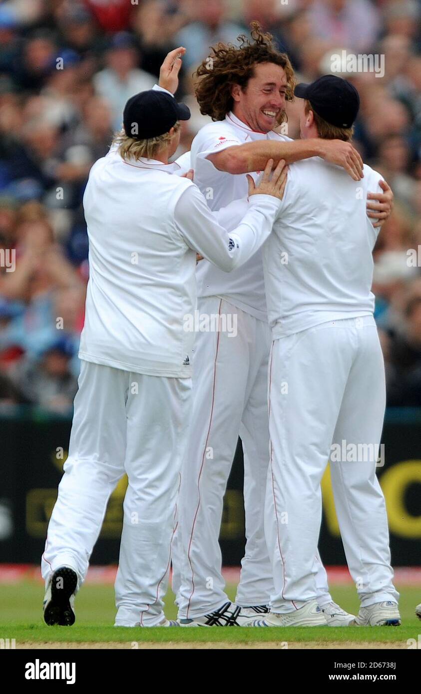 England's Ian Bell and Paul Collingwood congratulate Ryan Sidebottom on ...