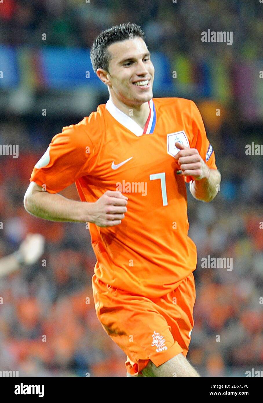 Holland's Robin Van Persie celebrates scoring his sides second goal of ...