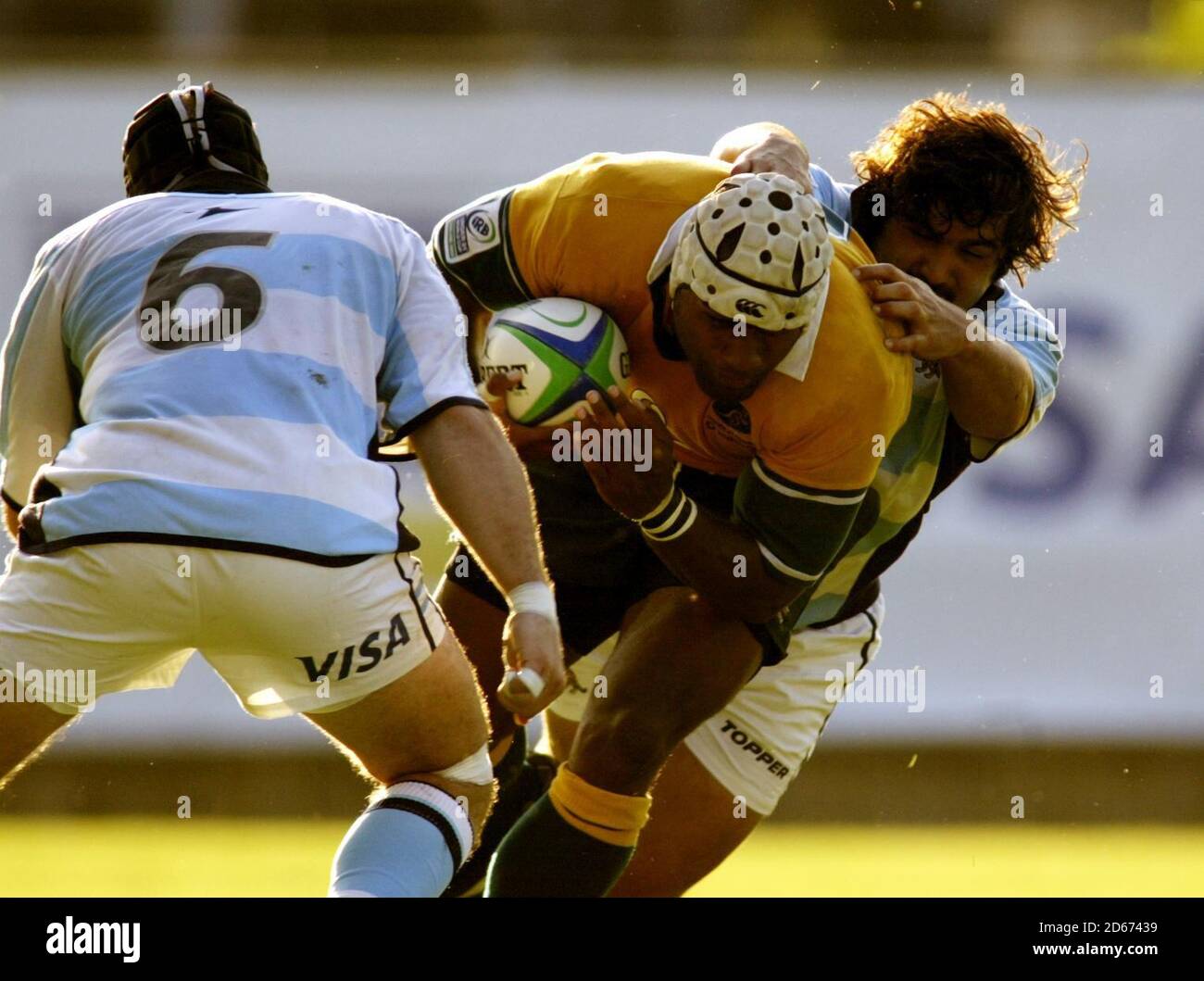 Australia's no 8 Jone Tawake moves the ball up the field Stock Photo ...