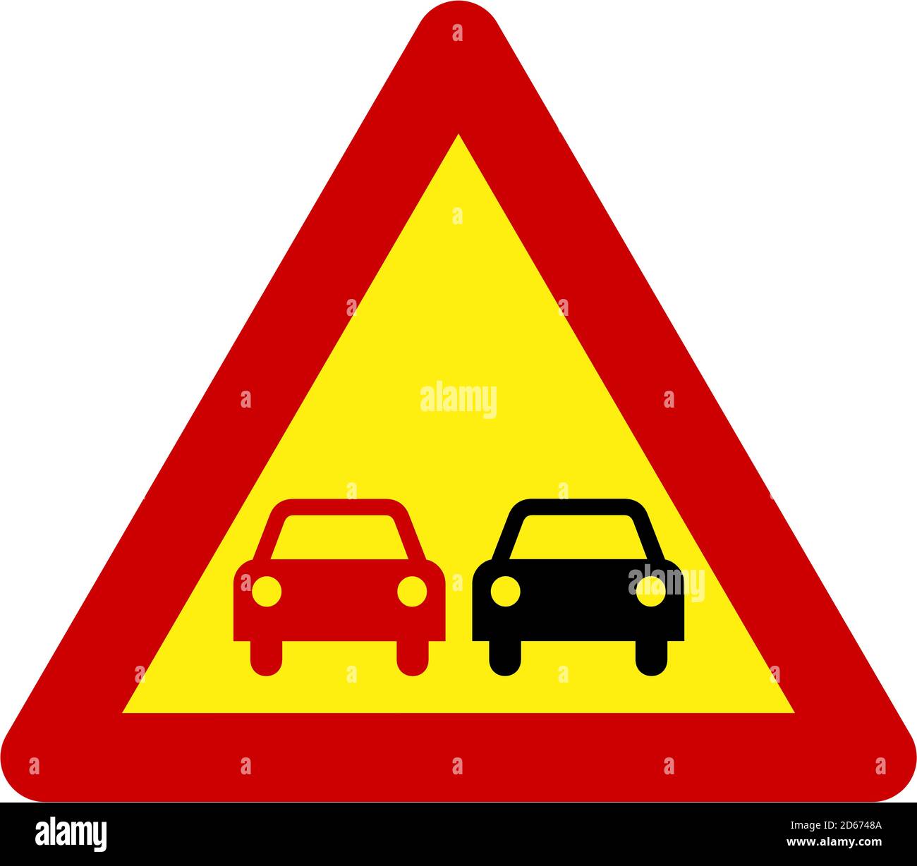 Warning sign with overtaking symbol Stock Photo - Alamy