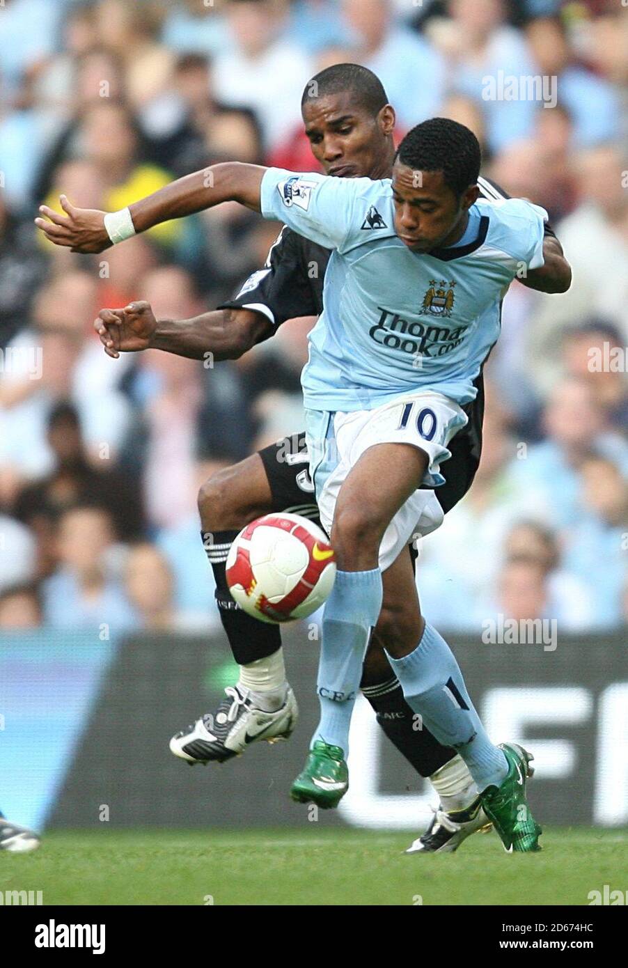 Chelsea's Florent Malouda challenges Manchester City's De Souza Robino ...