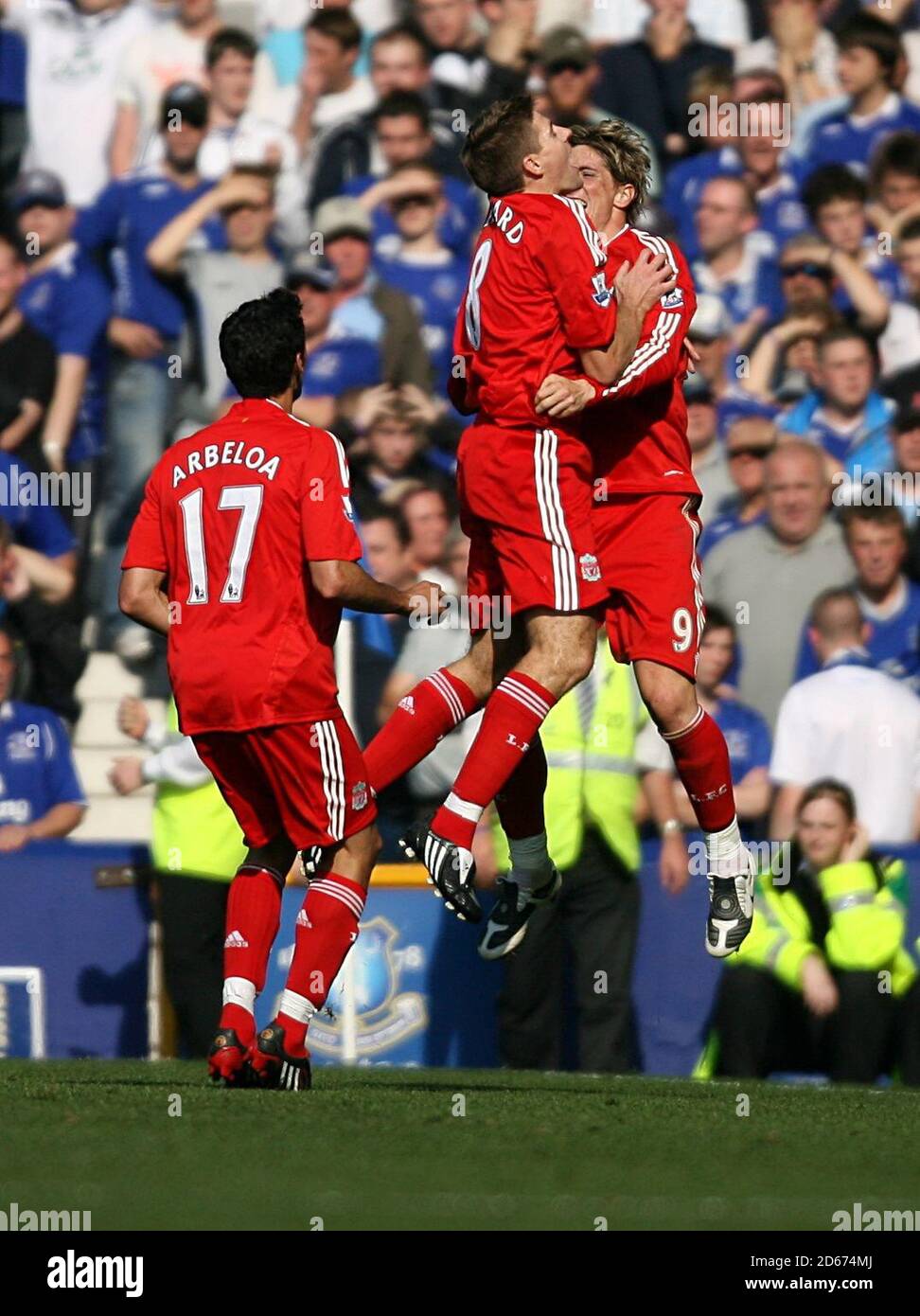 Liverpool's Fernando Torres (right) celebrates with his team-mate ...