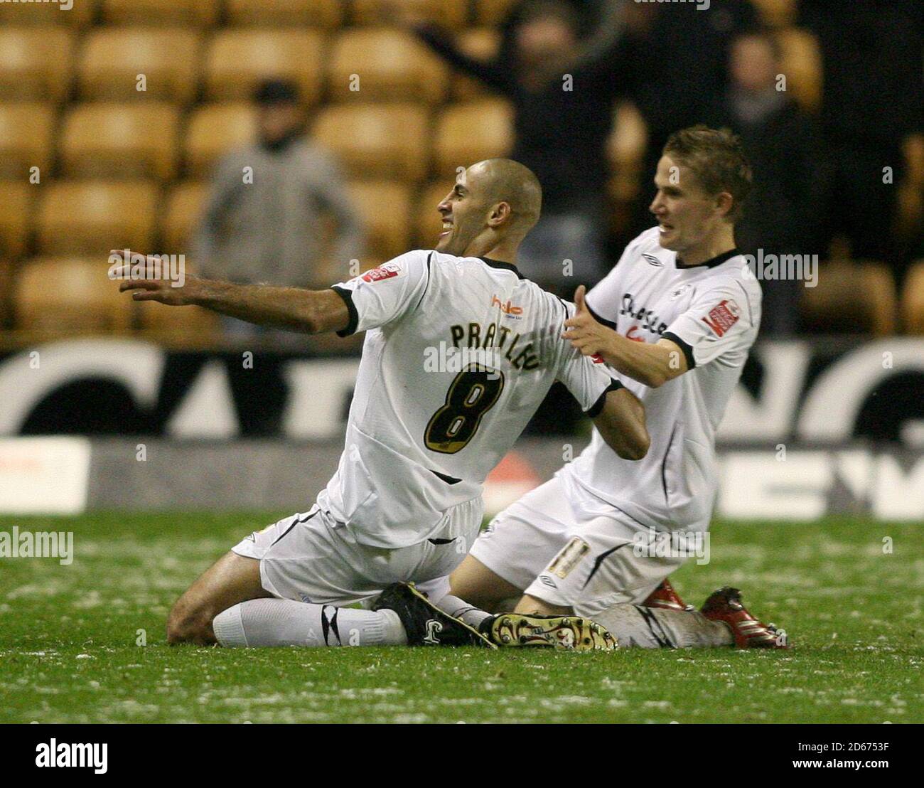 Swansea City's Darren Pratley celebrates his goal with Mark Gower Stock ...