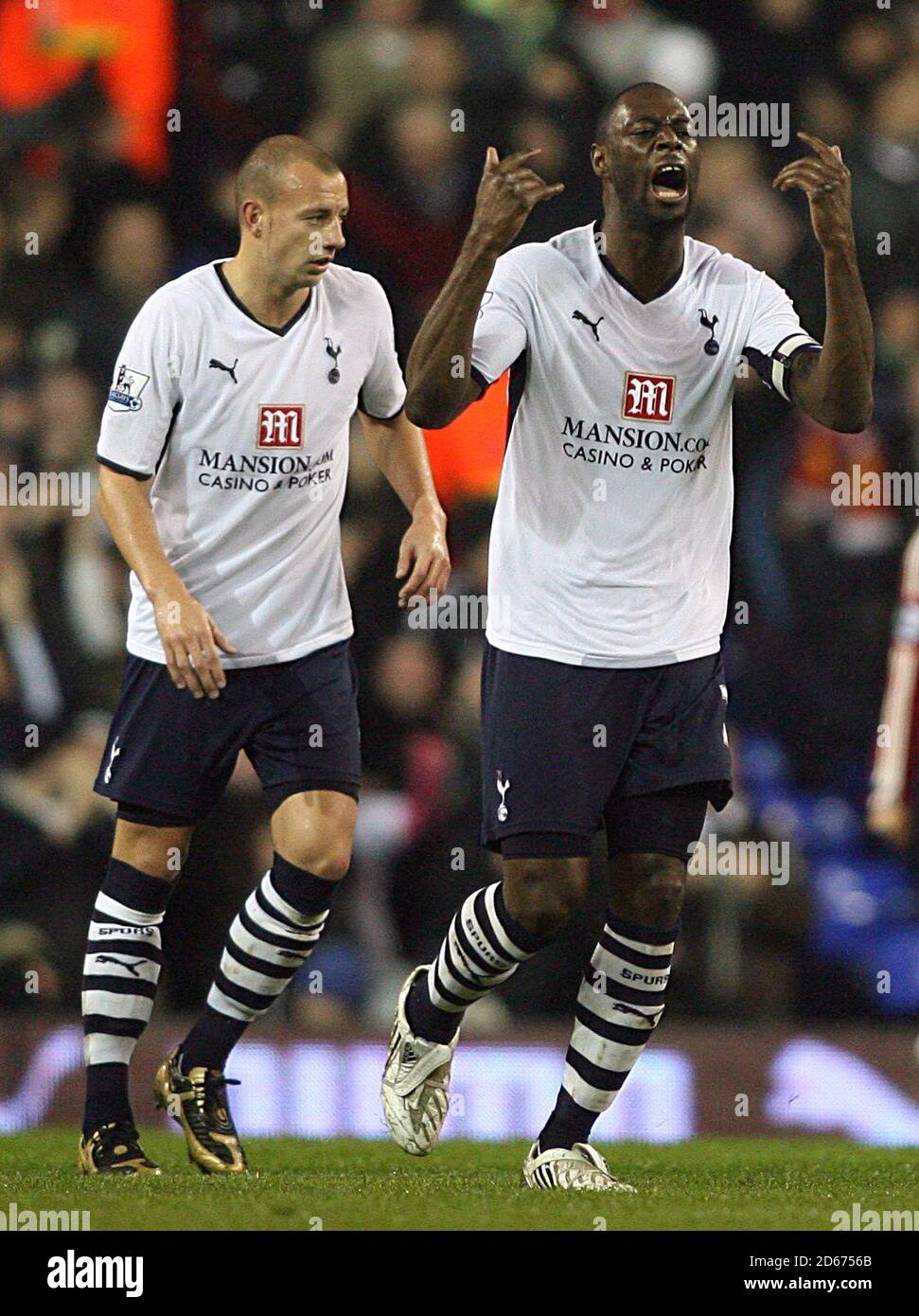 Tottenham Hotspur's Ledley King (r) celebrate after Liverpool's Jamie ...