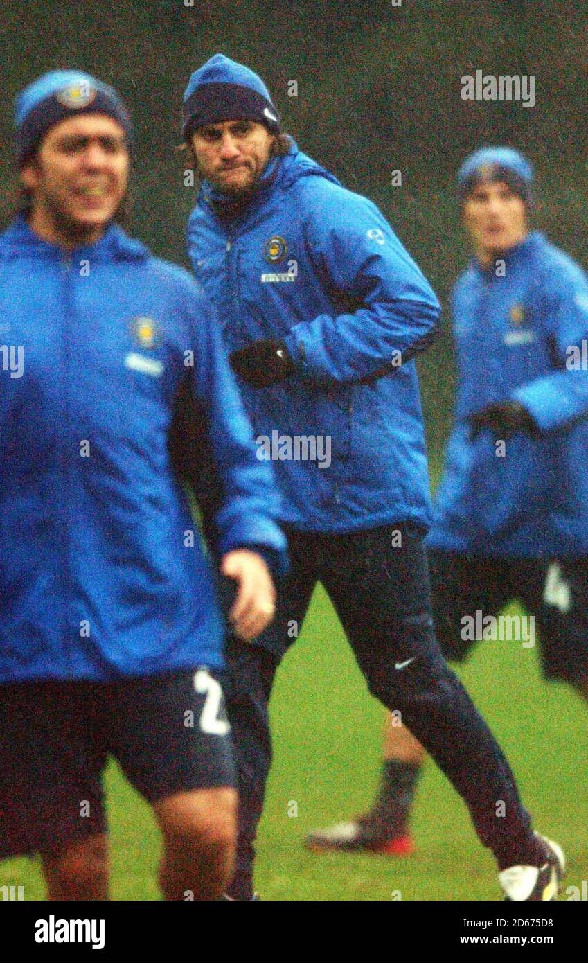 Inter Milan's Christian Vieri (centre) trains in the rain before to ...