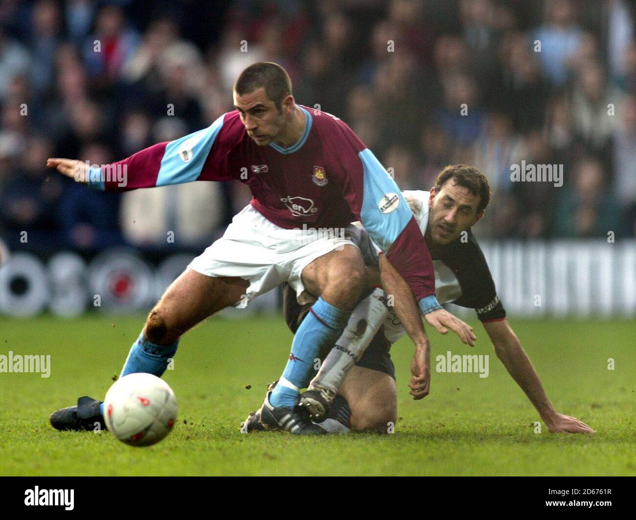 Fulham's Sylvain Legwinski and West Ham United's Kevin Horlock Stock ...