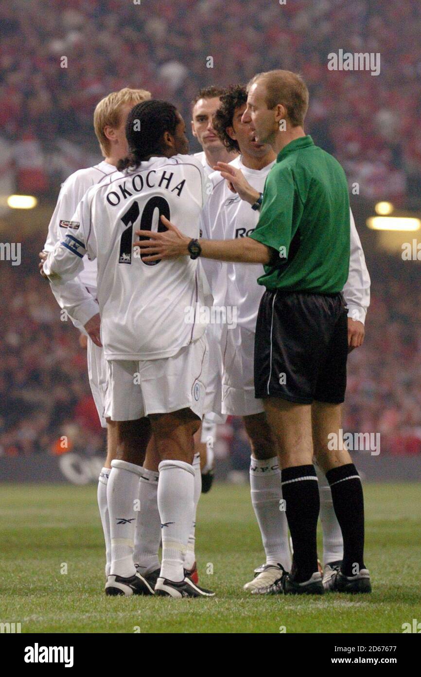 Bolton Wanderers' Jay-Jay Okocha, Per Frandsen and Ivan Campo complain ...
