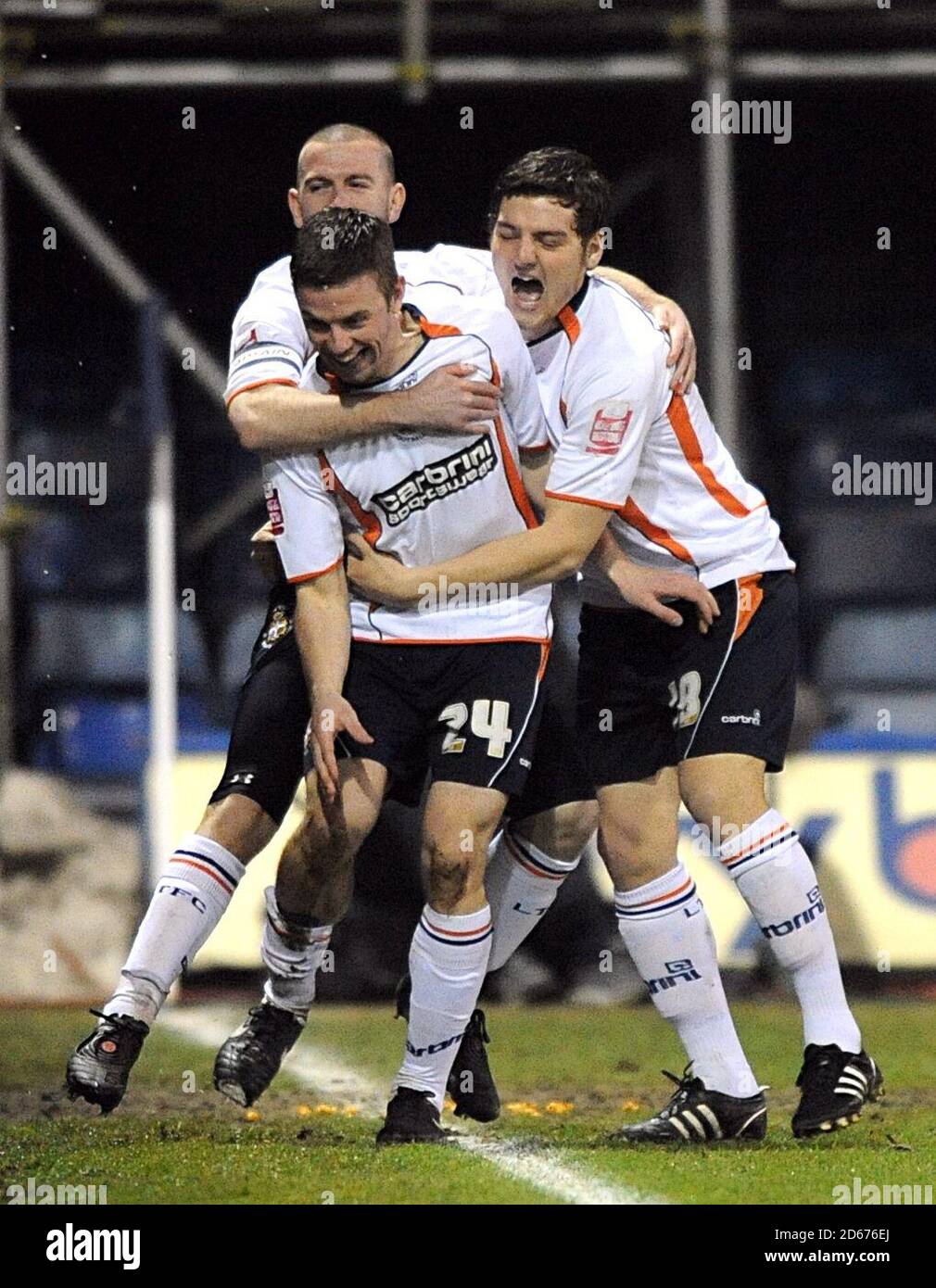 Luton Town's Tom Craddock (centre) celebrates with his team mates after ...