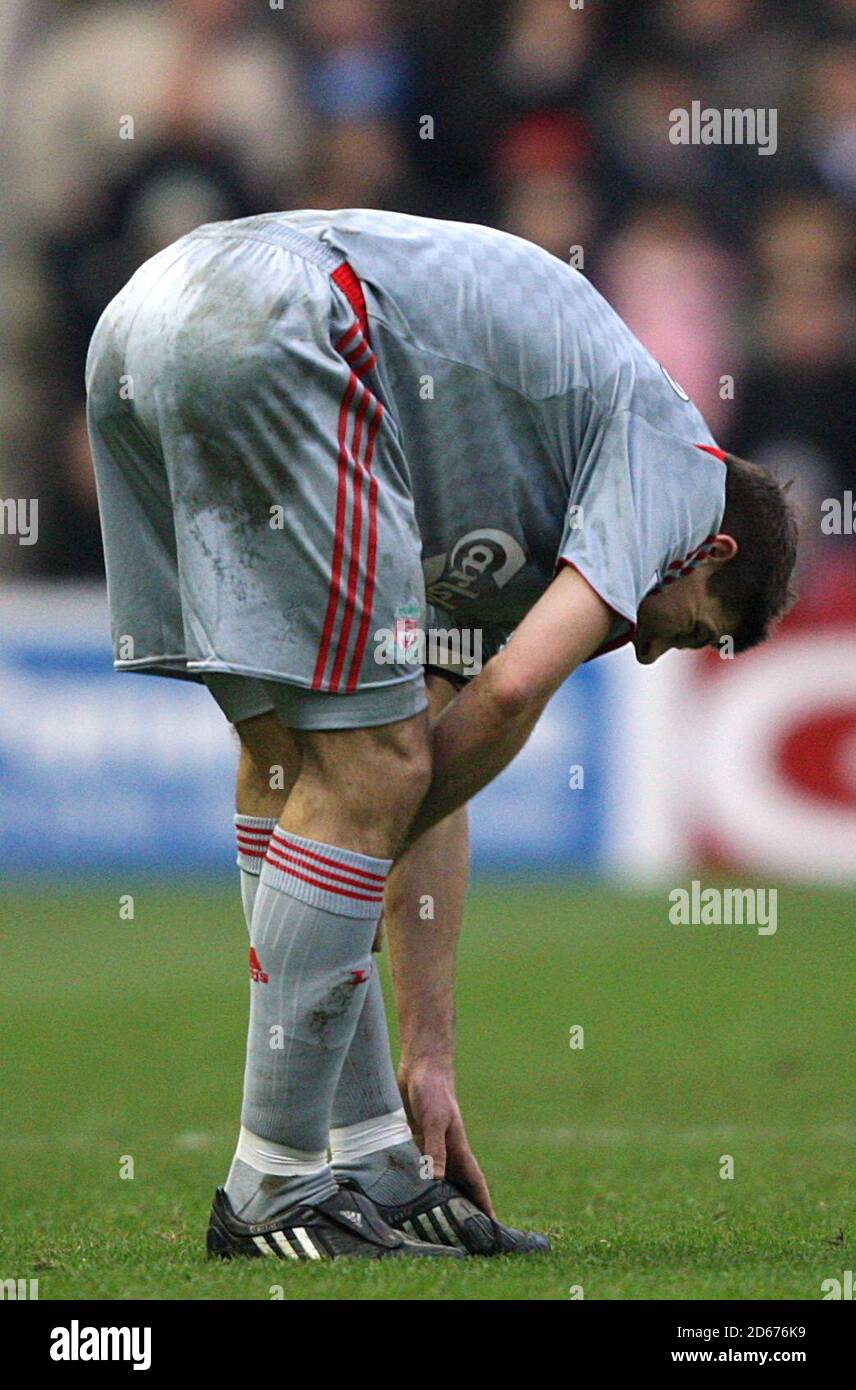 Liverpool's Steven Gerrard feels an injury during the macth at the ...