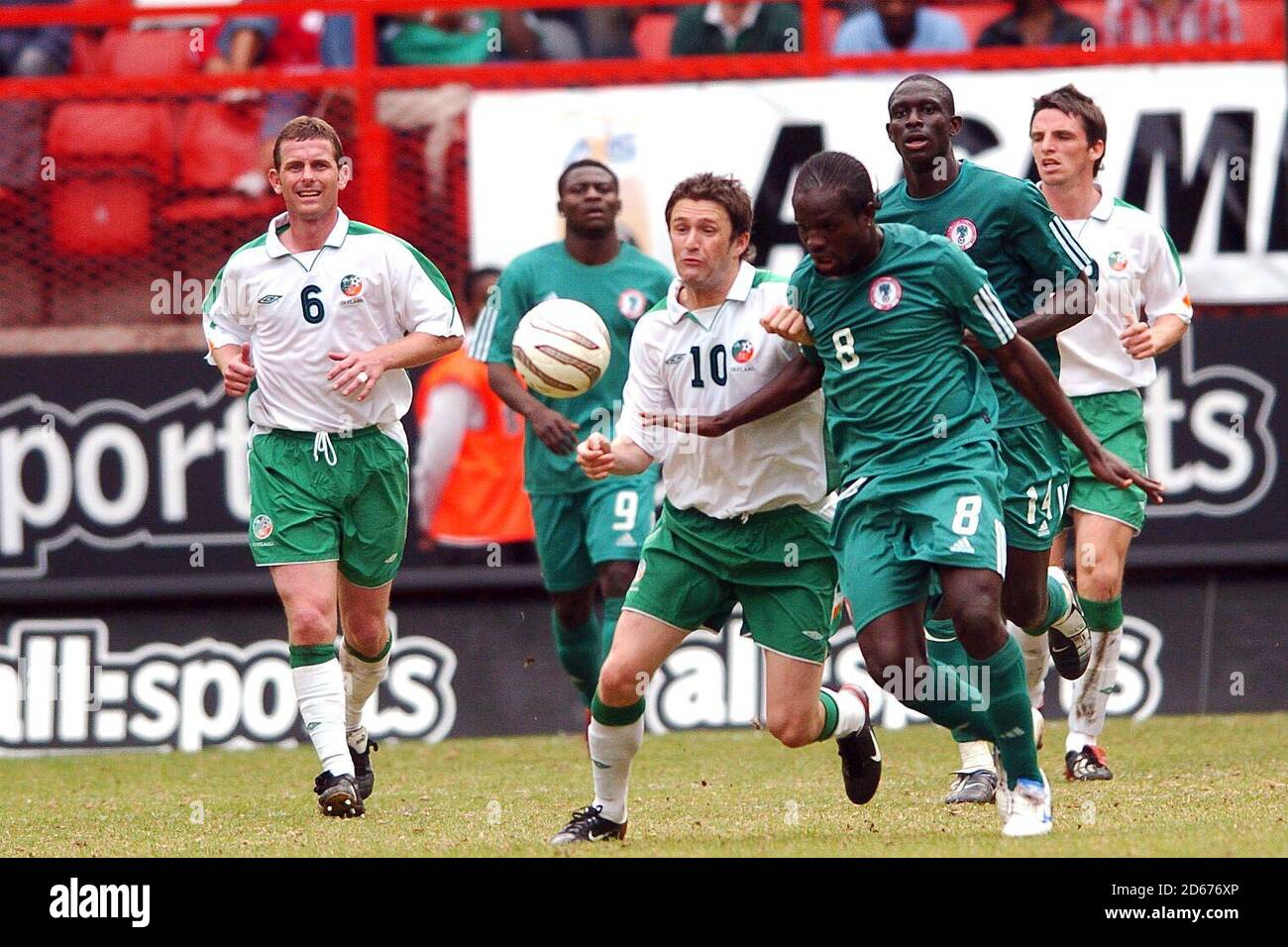 Ireland's Robbie Keane and Nigeria's Christian Obodo Stock Photo - Alamy