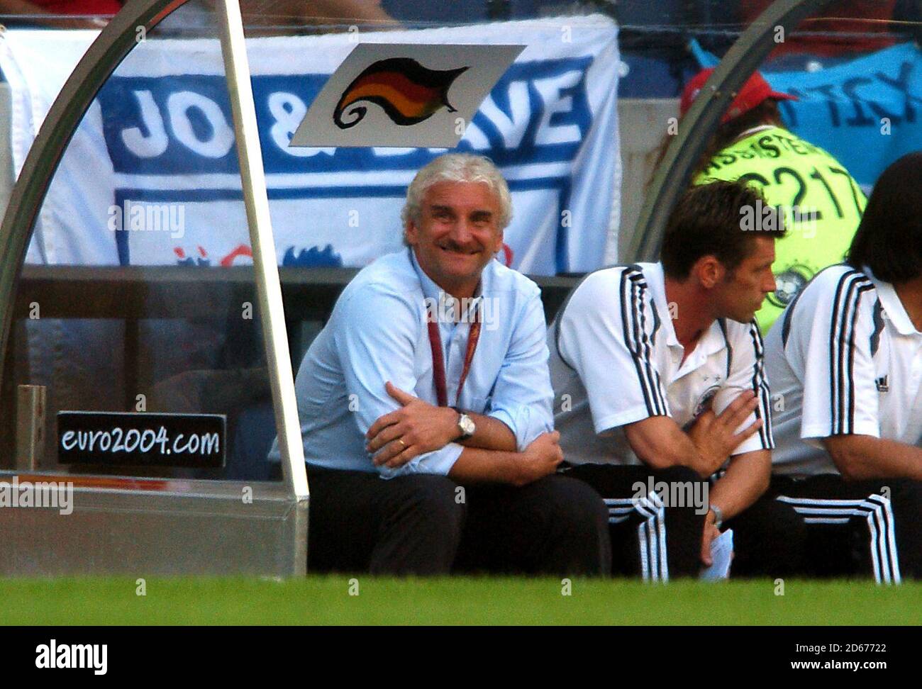 Germany coach Rudi Voller is all smiles after his team take the lead ...