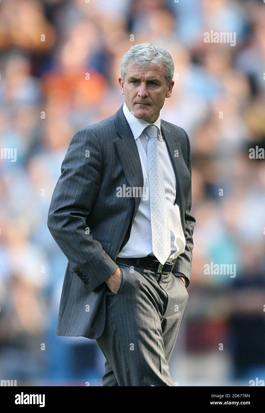 Manchester City manager Mark Hughes Stock Photo - Alamy