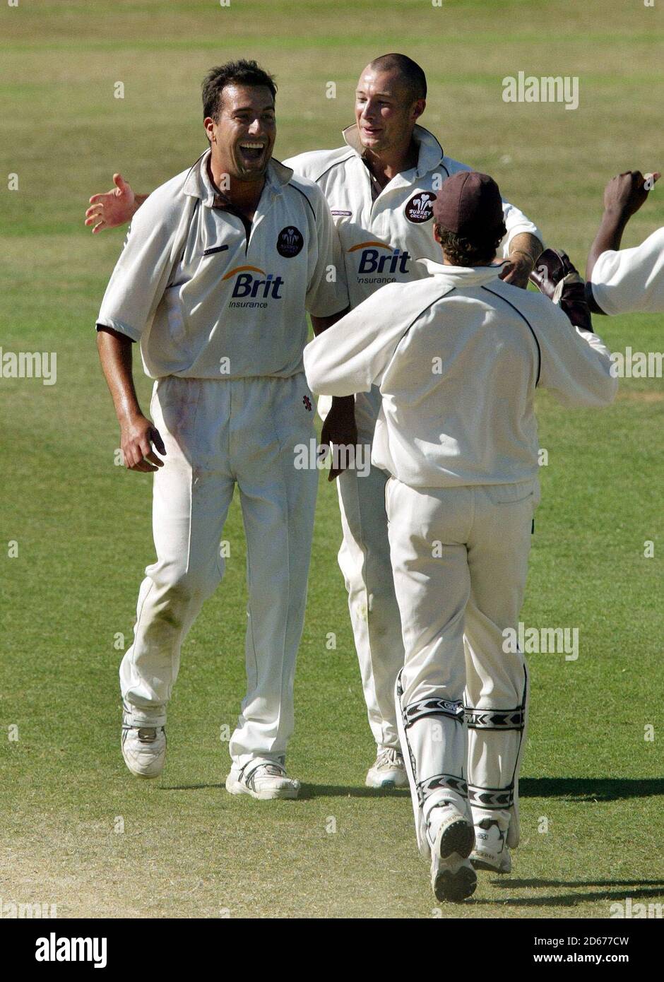 Surrey's Richard Clinton and Jonathan Batty celebrate with Jimmy Ormond ...