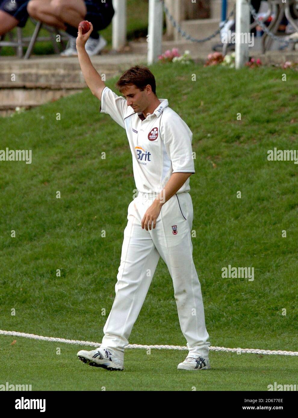 Surrey's Tim Murtagh celebrates catching out Lancashire's Dominic Cork ...