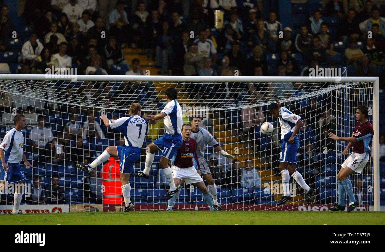Bury's Dwayne Mattis heads the ball into his own net from a Robbie ...