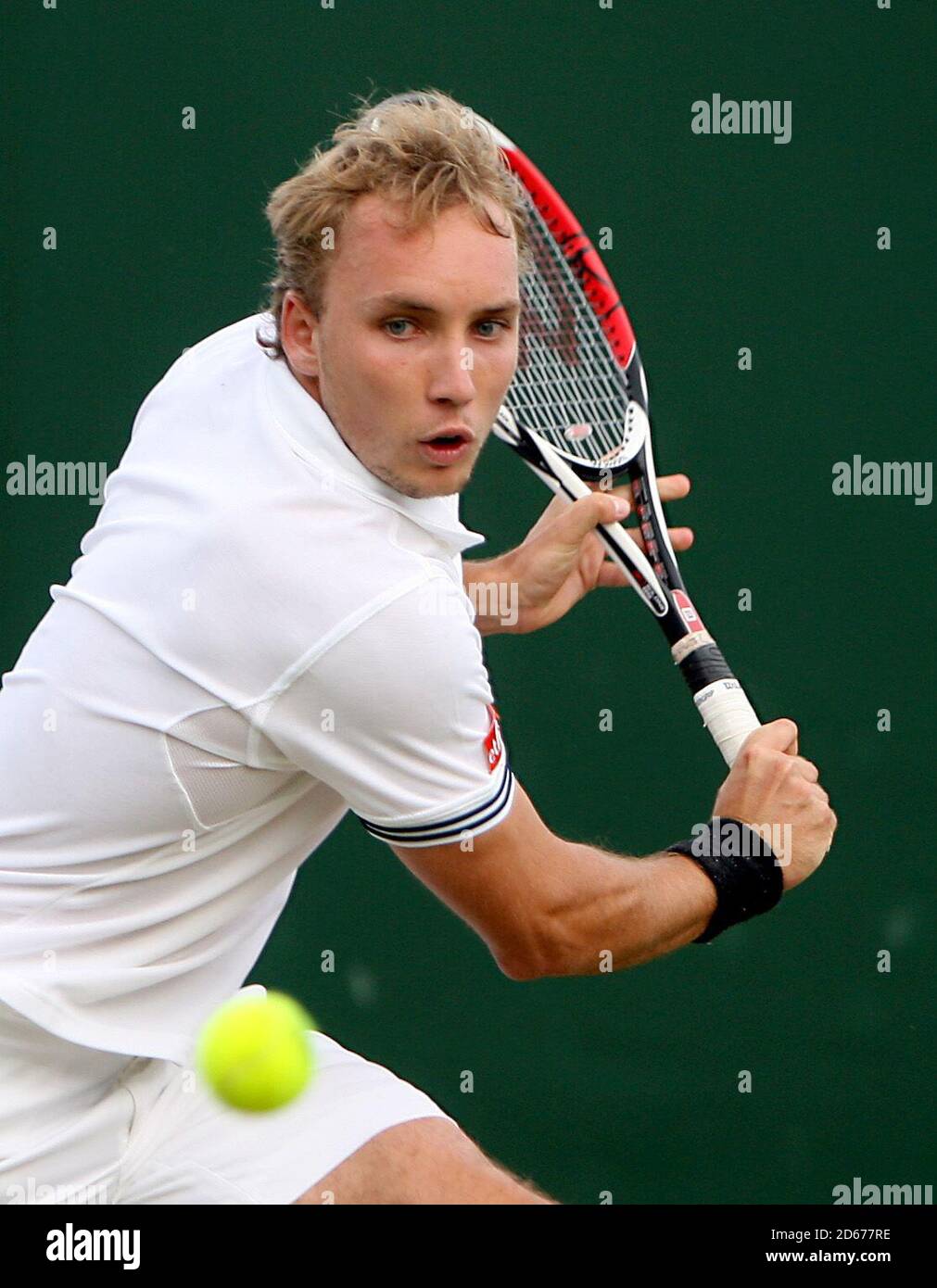 Belgium's Steve Darcis in action during his match against Croatia's Ivo ...