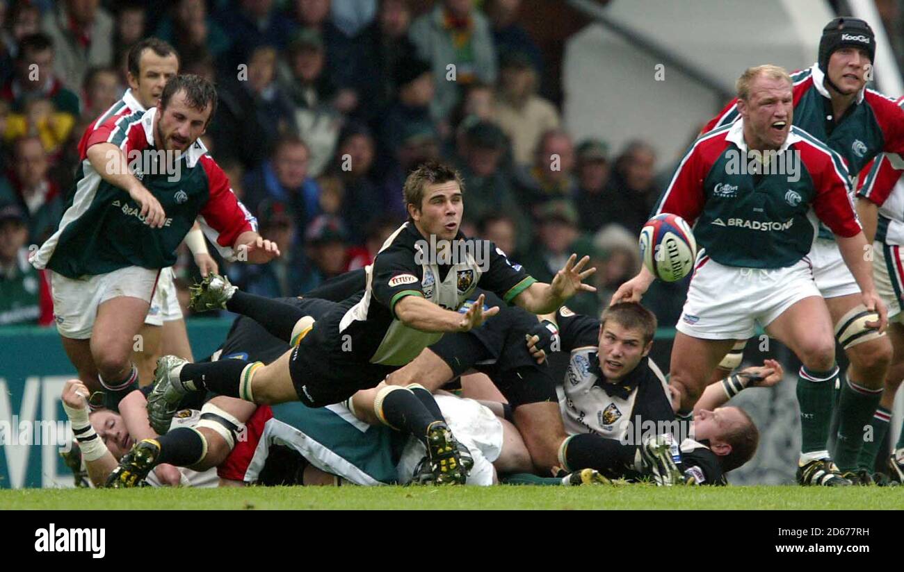 Northampton Saints' Johnny Howard executes a diving pass from the back ...