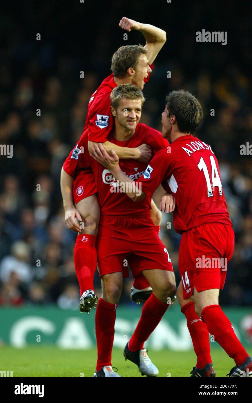 Liverpool's Igor Biscan celebrates his goal with Xabi Alonso and ...