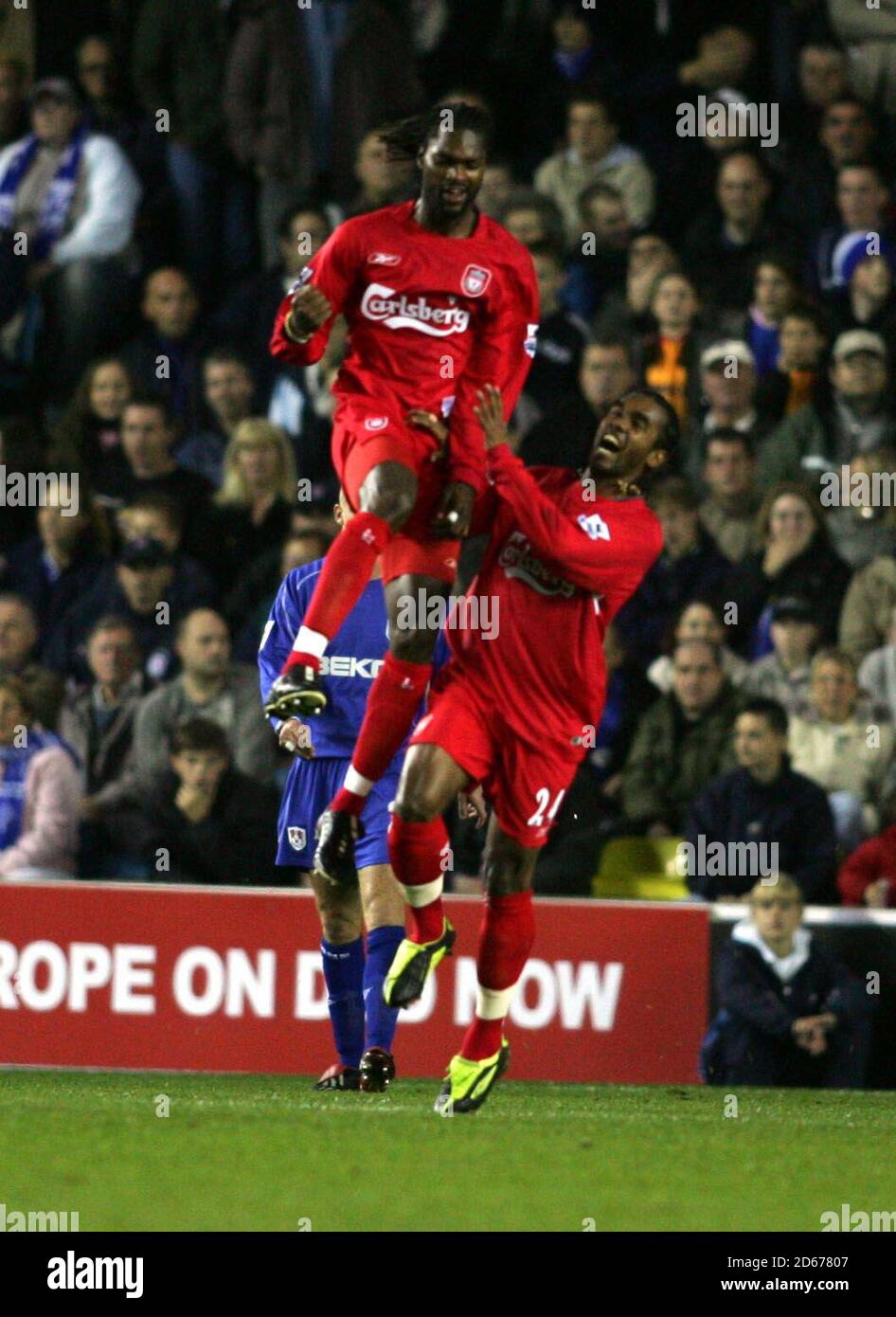Liverpool's Salif Diao celebrates scoring the opening goal with ...
