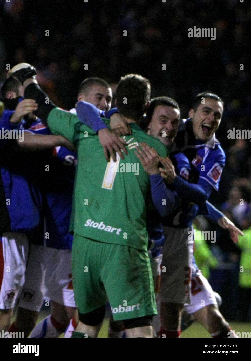 Carlisle United's goalkeeper Adam Collin is congratulated by his ...