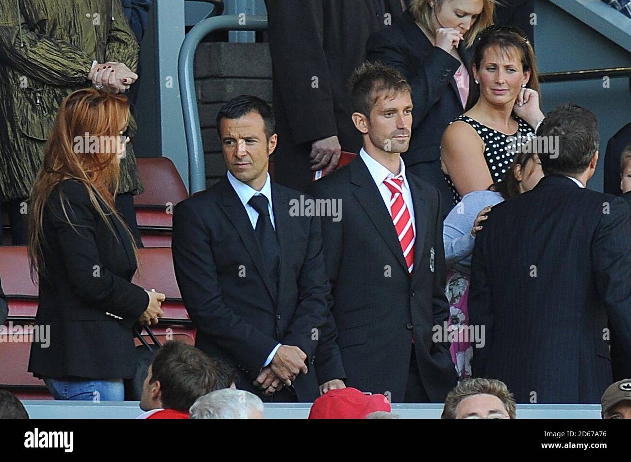 Liverpool's new signing Raul Meireles (centre right) watches the match ...