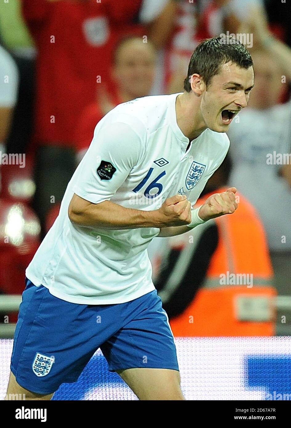 England's Adam Johnson celebrates scoring their third goal Stock Photo ...