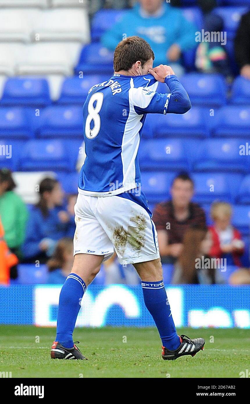 Birmingham City's Craig Gardner leaves the pitch after being shown the ...