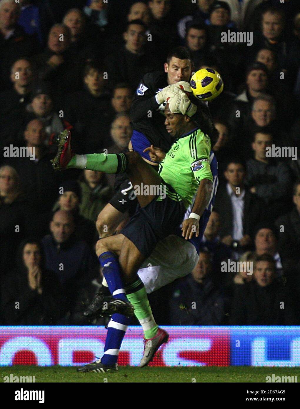 Birmingham City goalkeeper Ben Foster punches the ball away from ... Birmingham City goalkeeper Ben Foster punches the ball away from ...