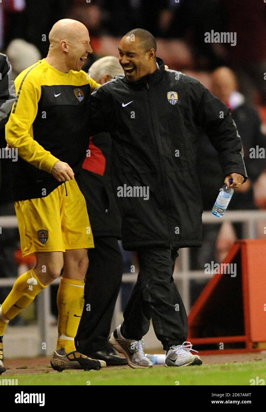 Notts County's Paul Ince and Lee Hughes celebrate at the final whistle ...