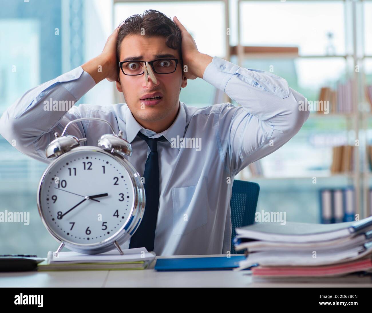 The businessman suffering from excessive armpit sweating Stock Photo ...