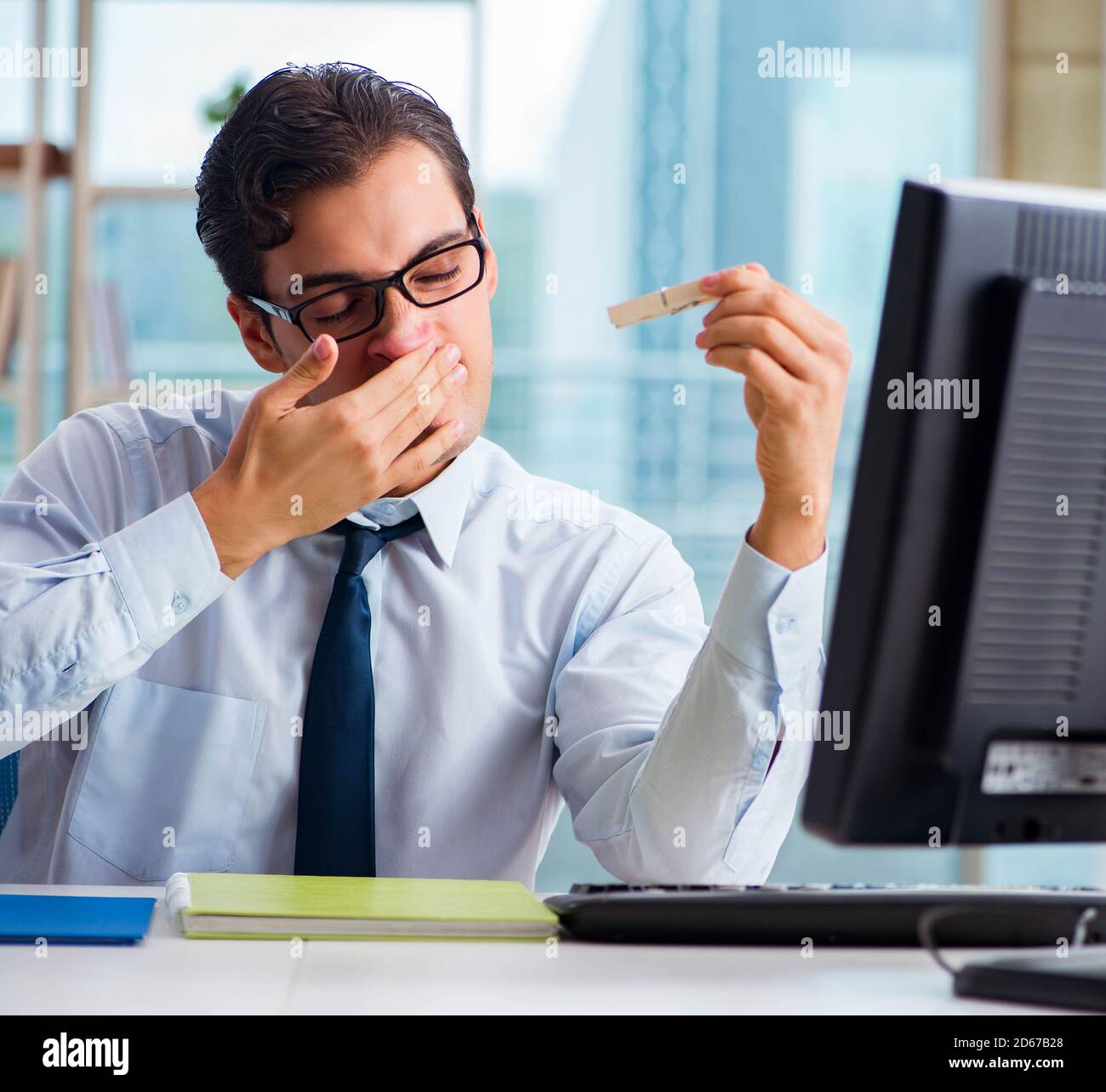 The businessman suffering from excessive armpit sweating Stock Photo ...
