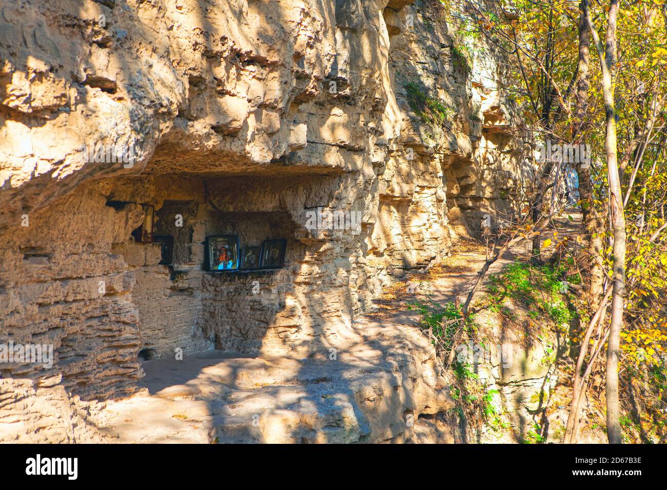 Ancient monastery with place for praying . Monk's room in the rock ...