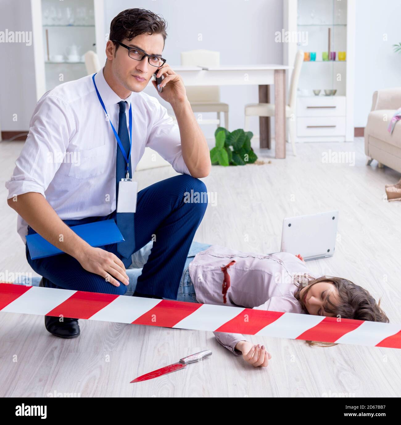Forensic investigator at the crime scene investigating woman murder ...