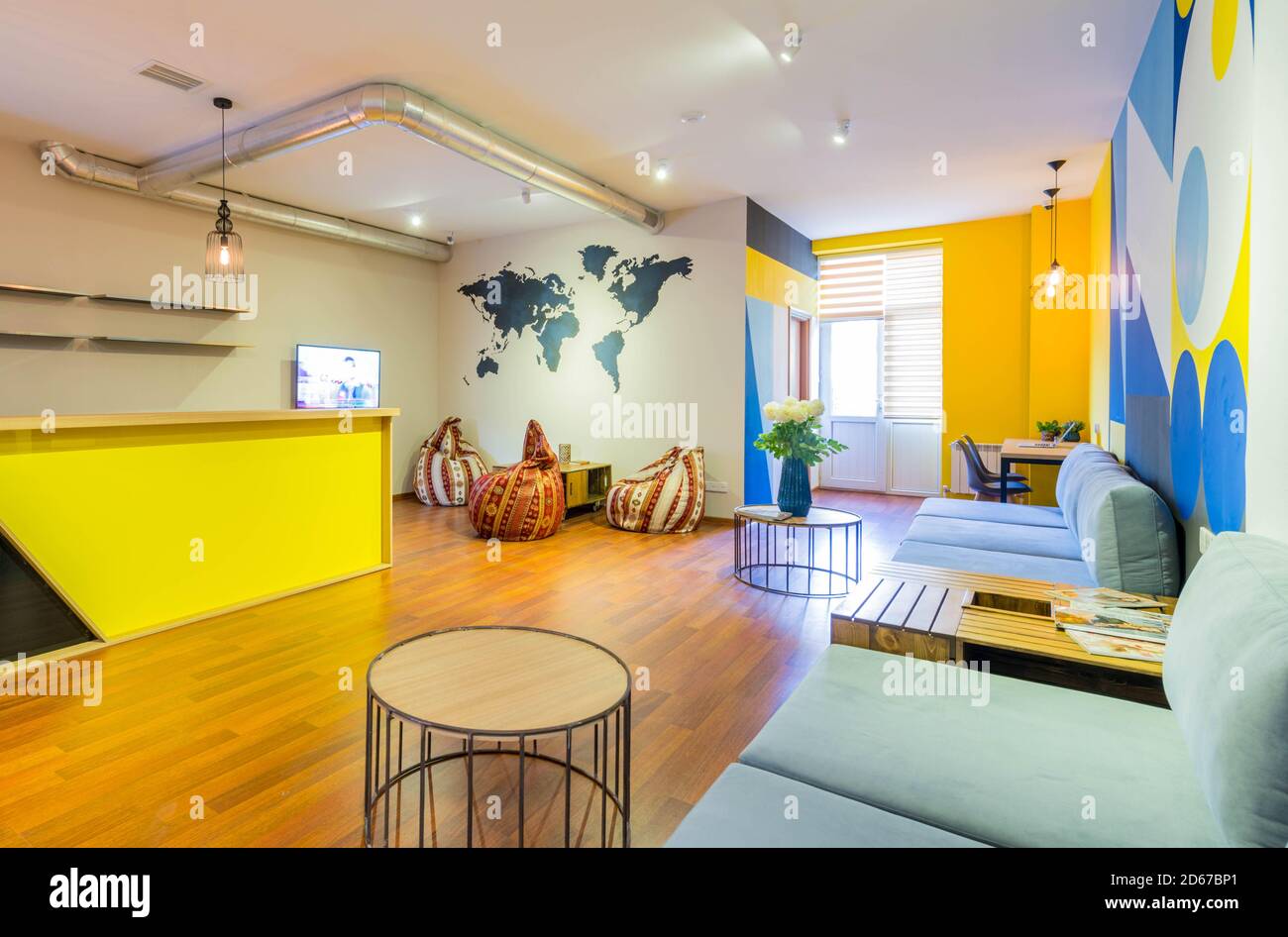 Hotel reception of hostel dormitory Stock Photo - Alamy