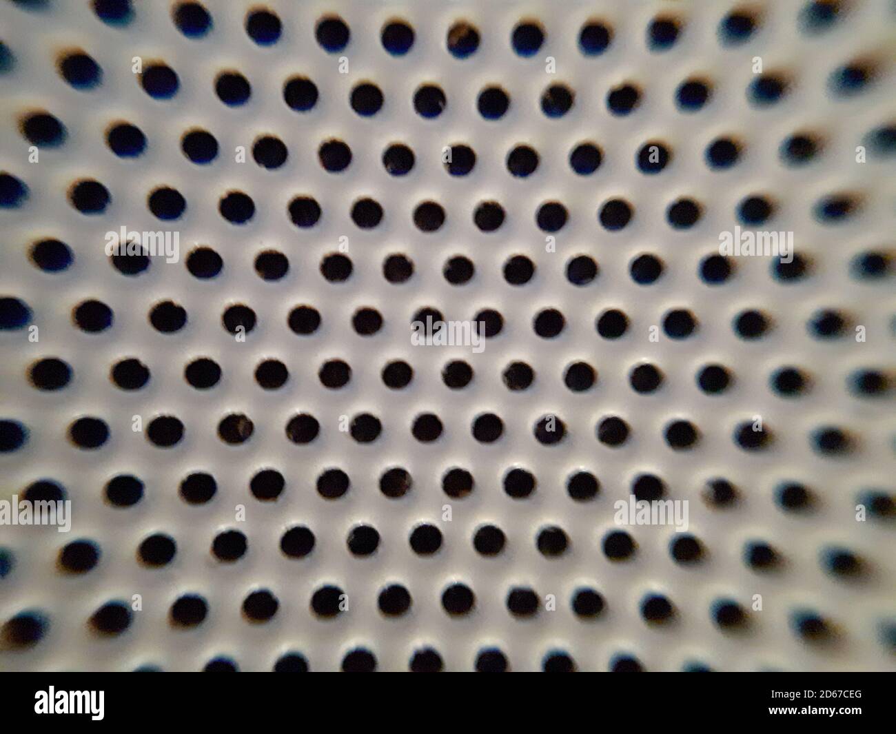 Metal textured background with holes Stock Photo - Alamy