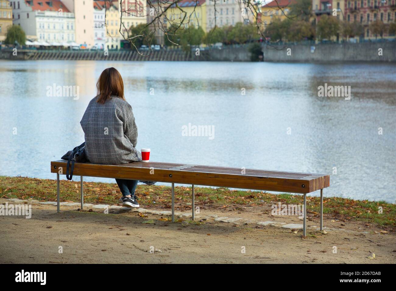 Woman sitting alone outdoor hi-res stock photography and images - Alamy