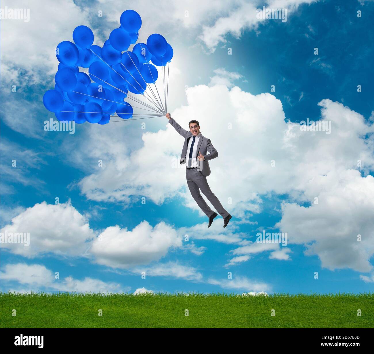 The businessman flying balloons on bright day Stock Photo - Alamy