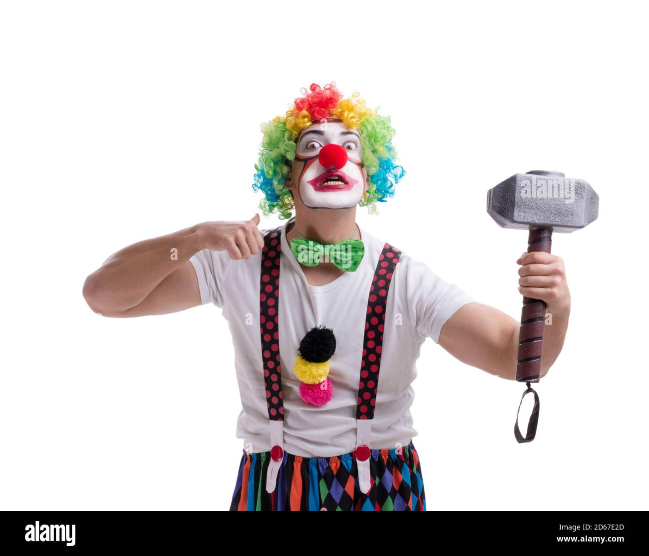 The funny clown with a hammer isolated on white background Stock Photo ...