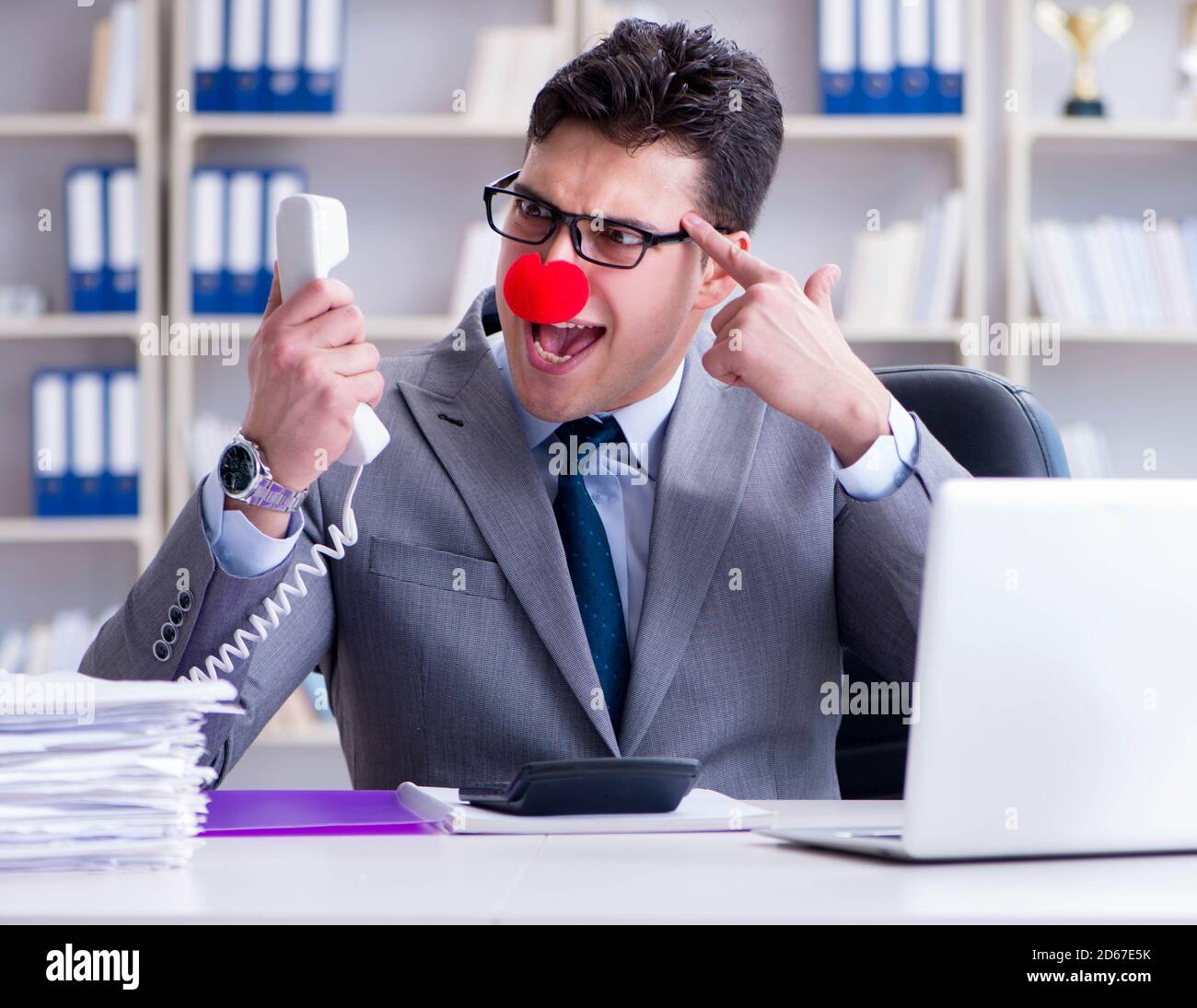 The clown businessman angry frustrated working in the office Stock ...