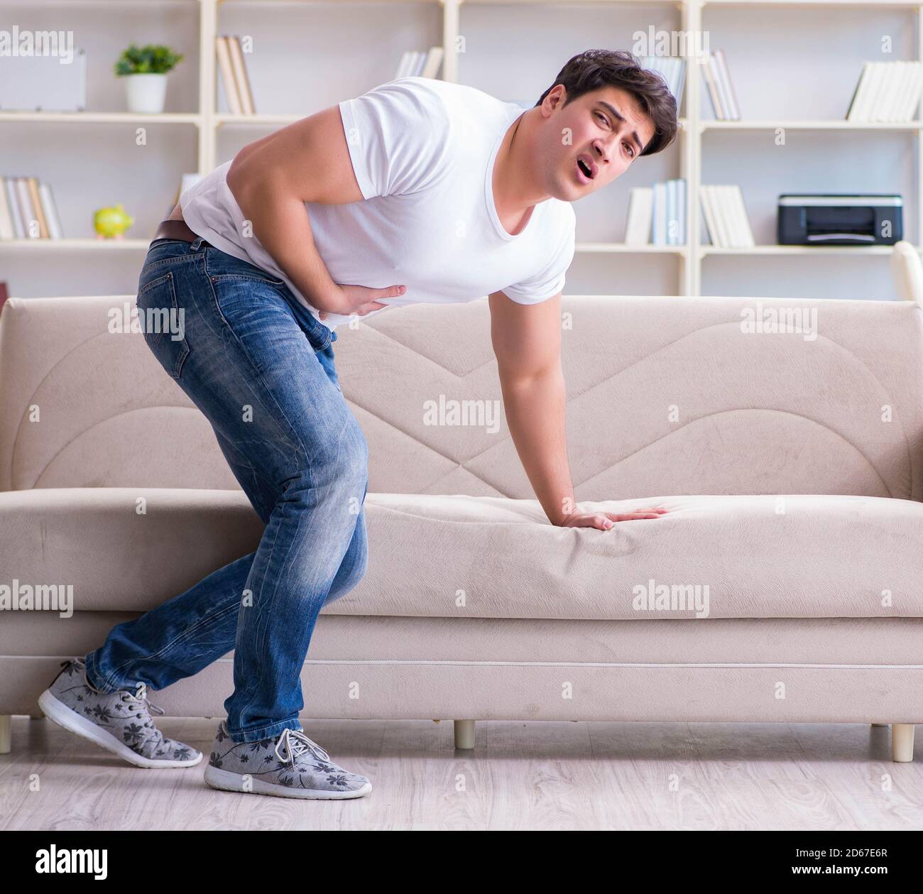 The man suffering from sick stomach and vomiting Stock Photo - Alamy