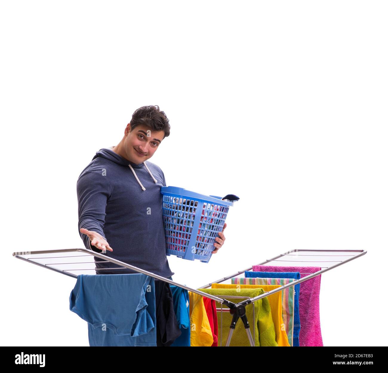 The husband man doing laundry isolated on white Stock Photo - Alamy