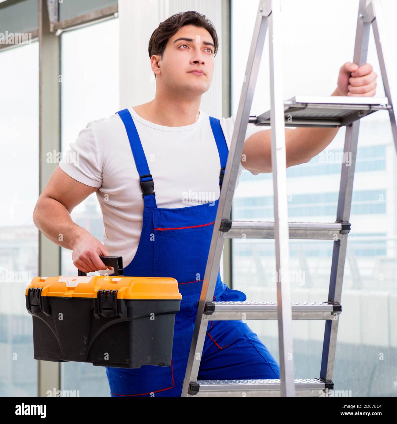 Man ladder plumbing tools hi-res stock photography and images - Alamy