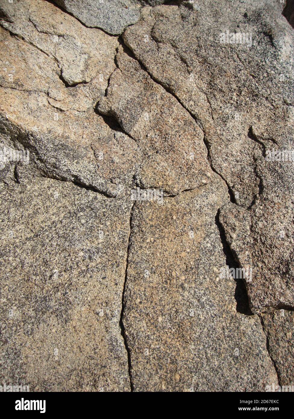 Vertical closeup shot of cracks and line pattern in a rock Stock Photo ...