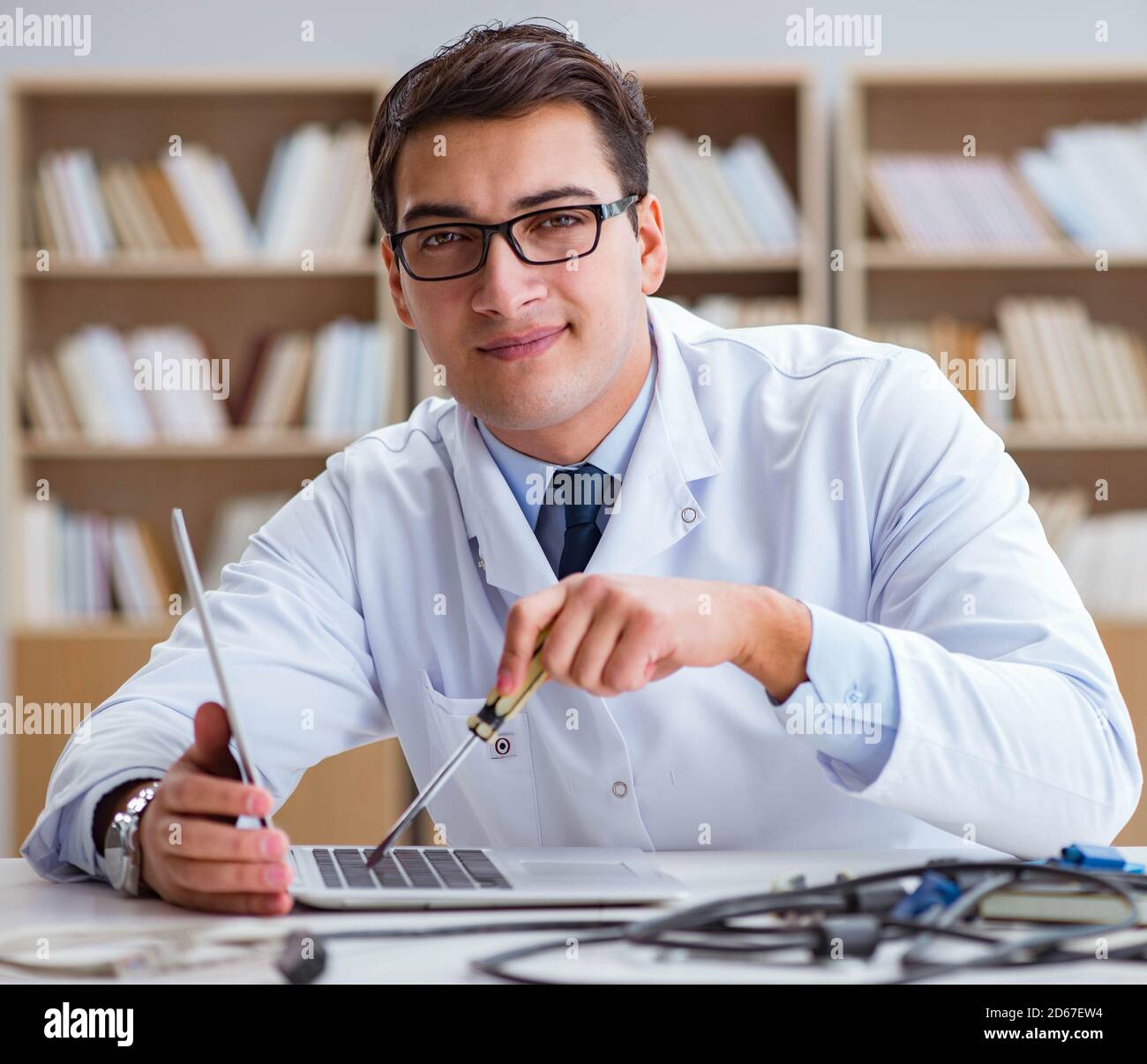 The it technician repairing broken laptop notebook computer Stock Photo ...