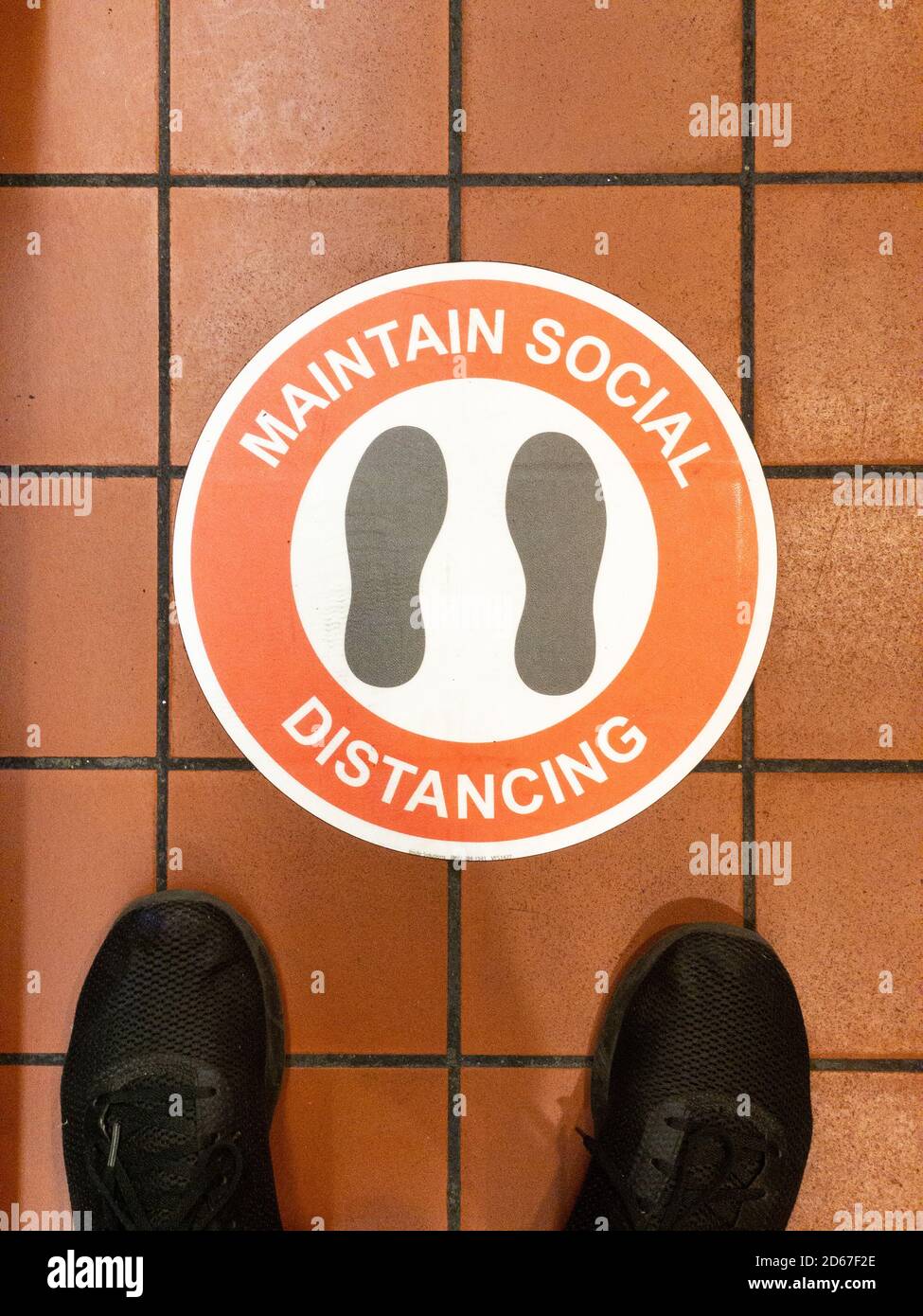 Standing Next to a Social Distancing Marker Stock Photo - Alamy
