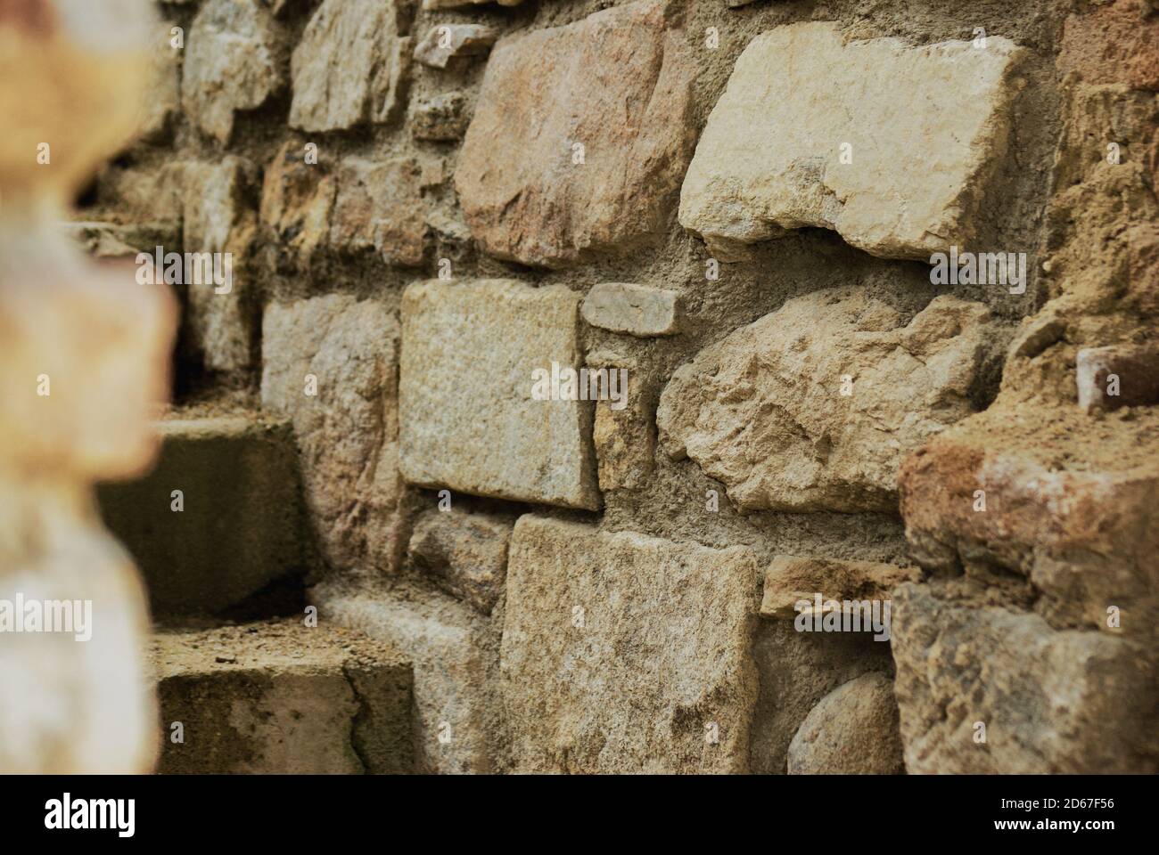 Old weathered stone wall texture Stock Photo - Alamy
